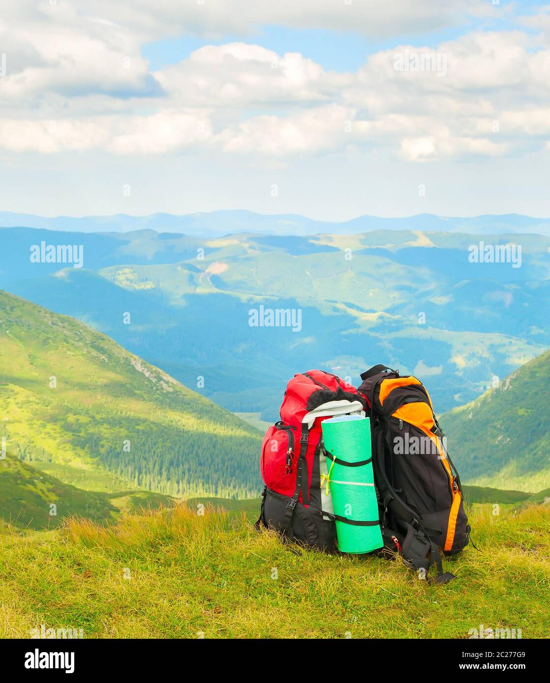 Hikers backpacks, Carpathian mountains landscape Stock Photo - Alamy