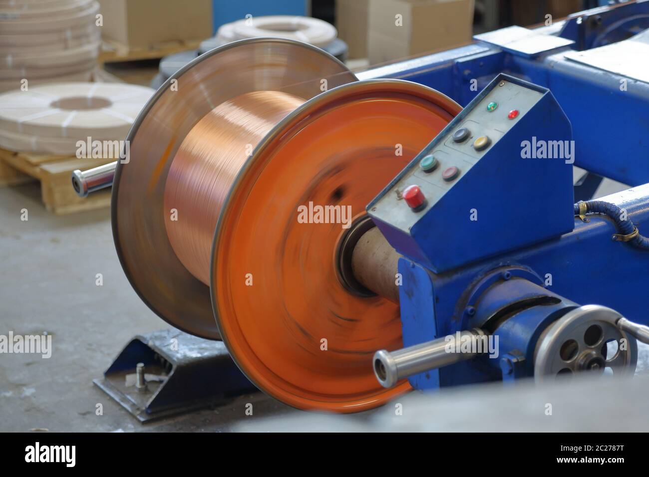 Massive industrial bobbins with twisted copper wire Stock Photo - Alamy