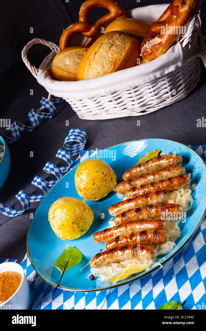 thuringian bratwurst with sauerkraut and dumplings Stock Photo - Alamy