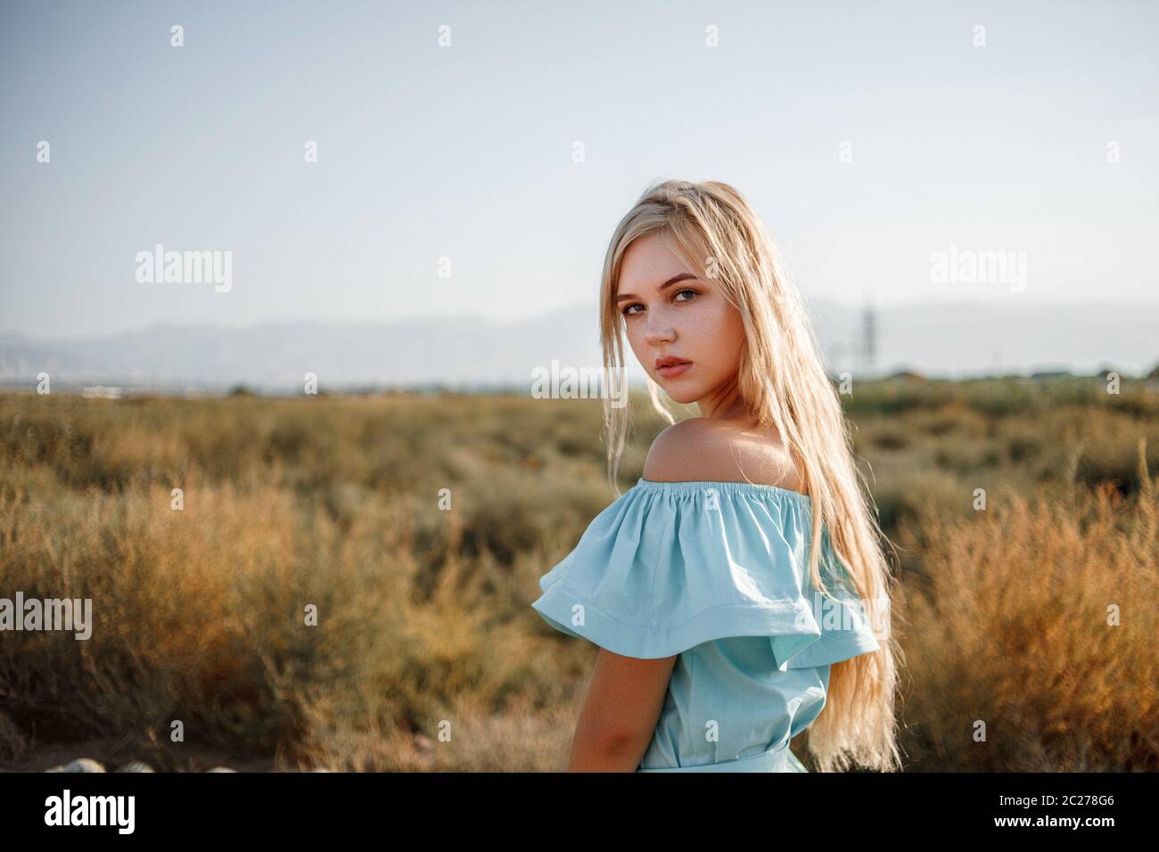 Light blue dress hi-res stock photography and images - Alamy
