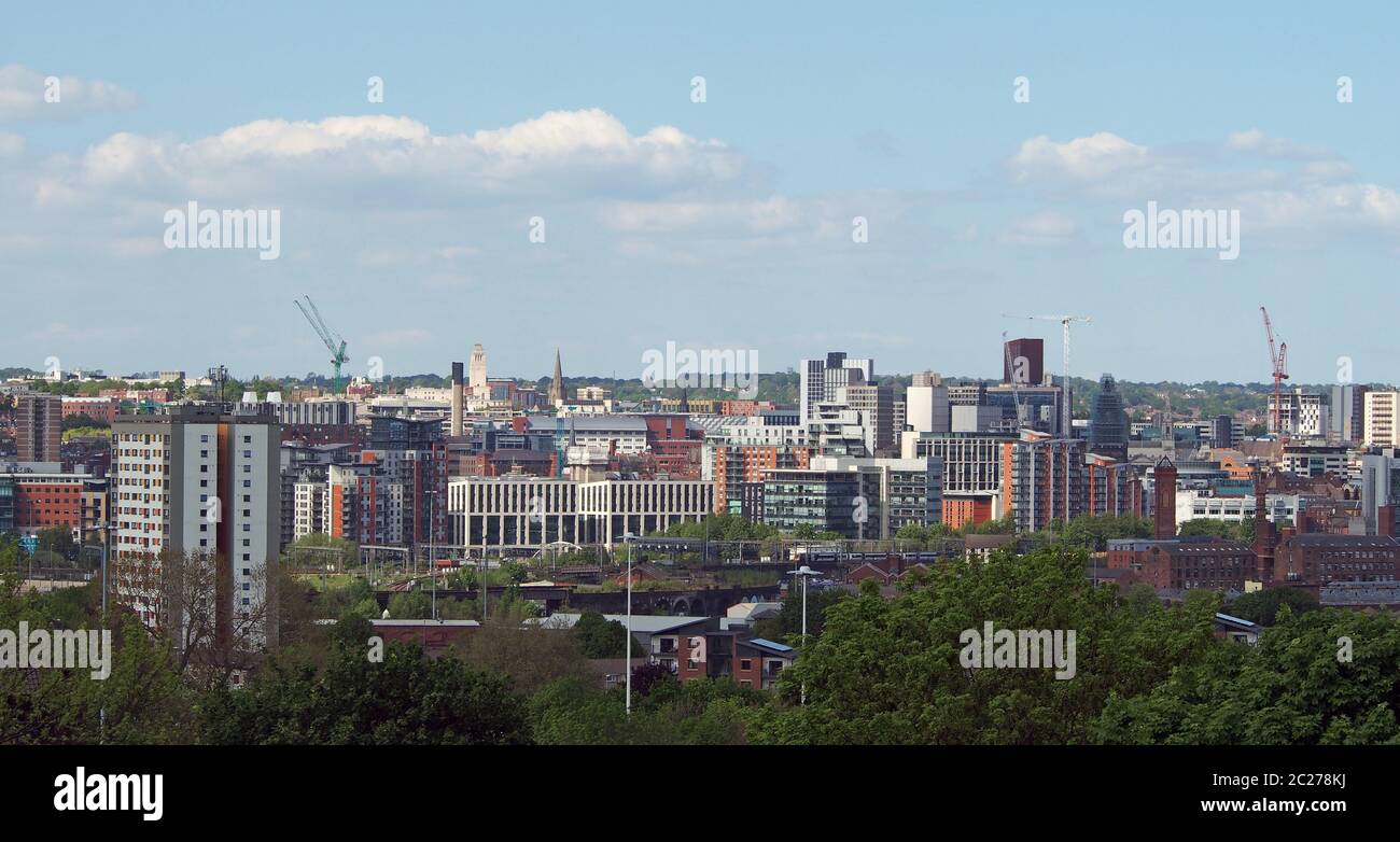 a wide cityscape view of leeds city centre taken from above showing ...