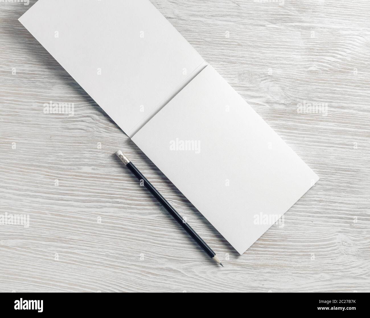 Notepad and pencil Stock Photo - Alamy