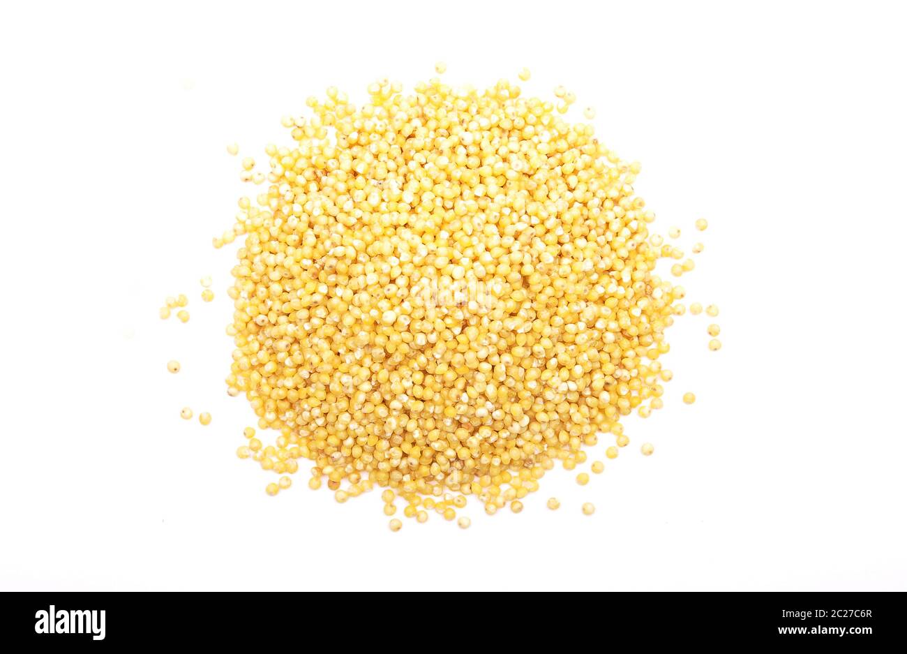 Raw millet on white background Stock Photo - Alamy