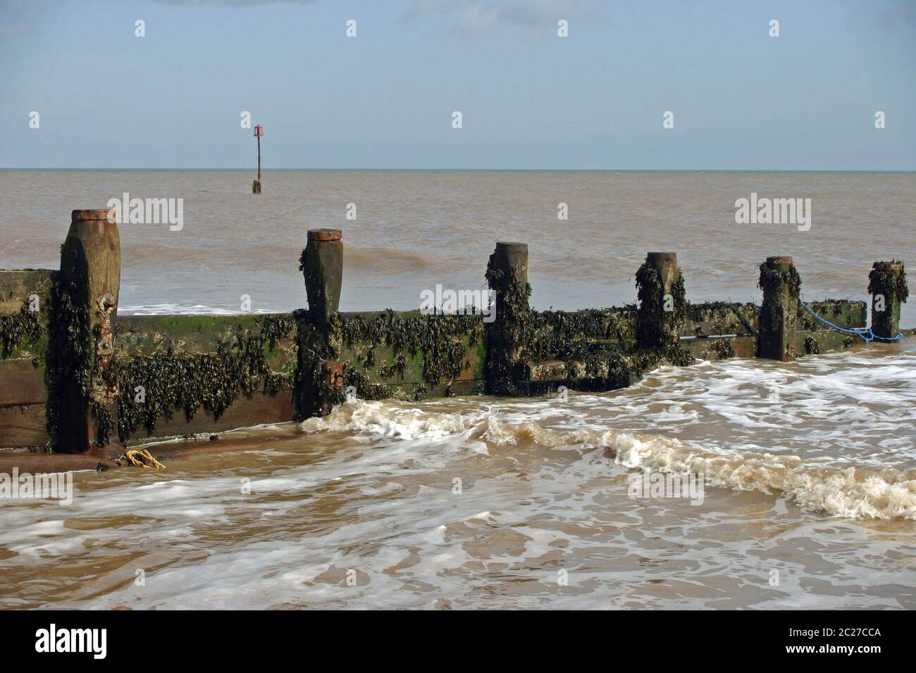 Yellow groyne marker hi-res stock photography and images - Alamy