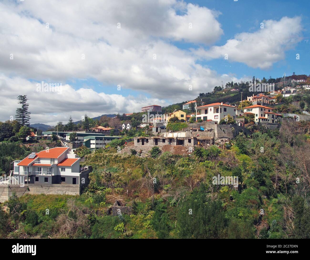 an aerial view of funchal in madeira with houses and farms on a ...