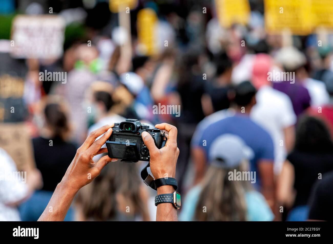 Someone takes a photo of the crowd assembled at Black Lives Matter ...