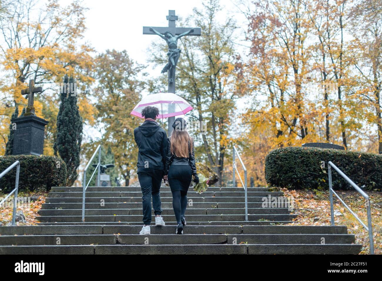 Couple walking in cemetery in hi-res stock photography and images - Alamy