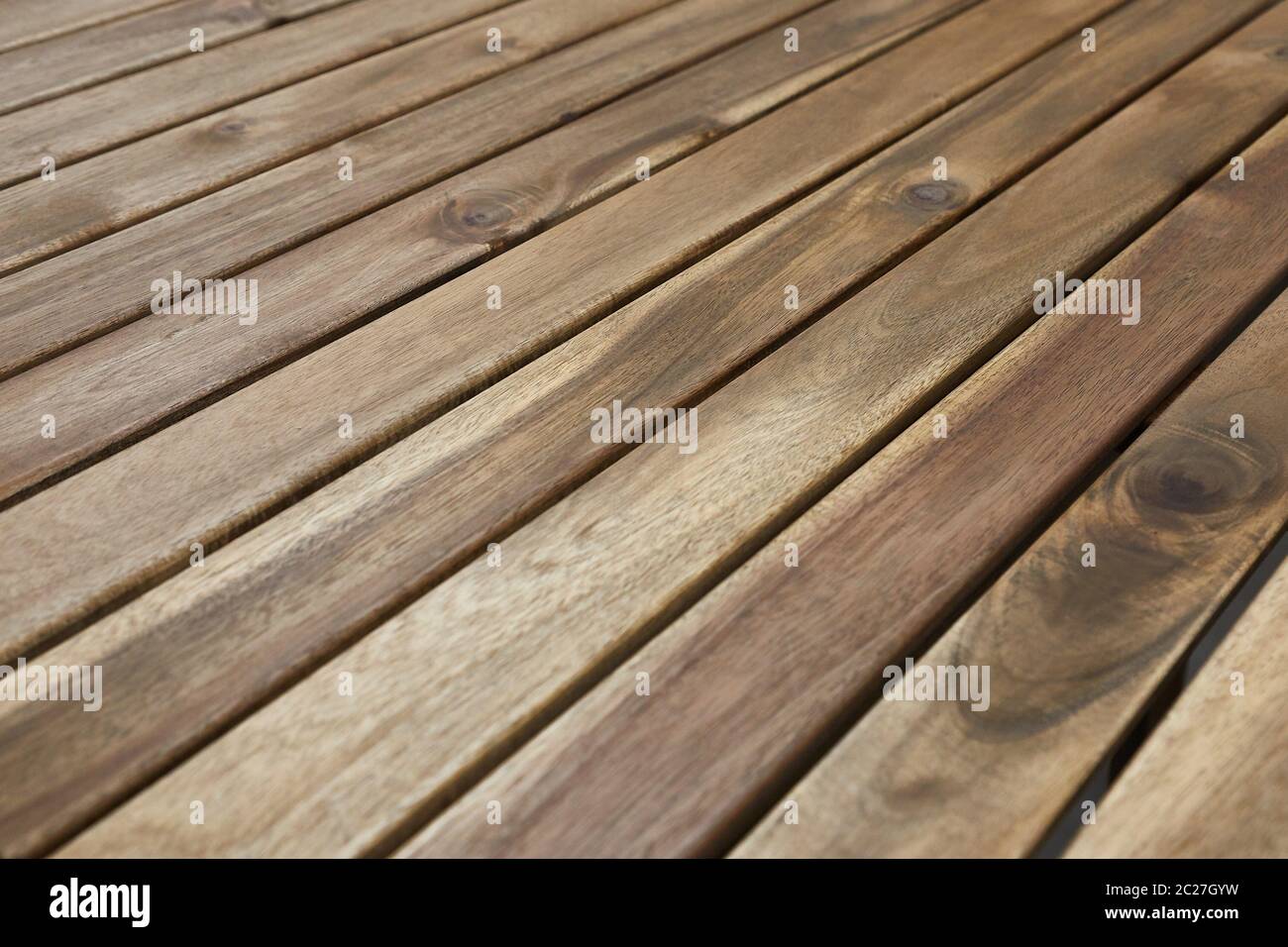 Wooden lumber table surface for a garden Stock Photo - Alamy