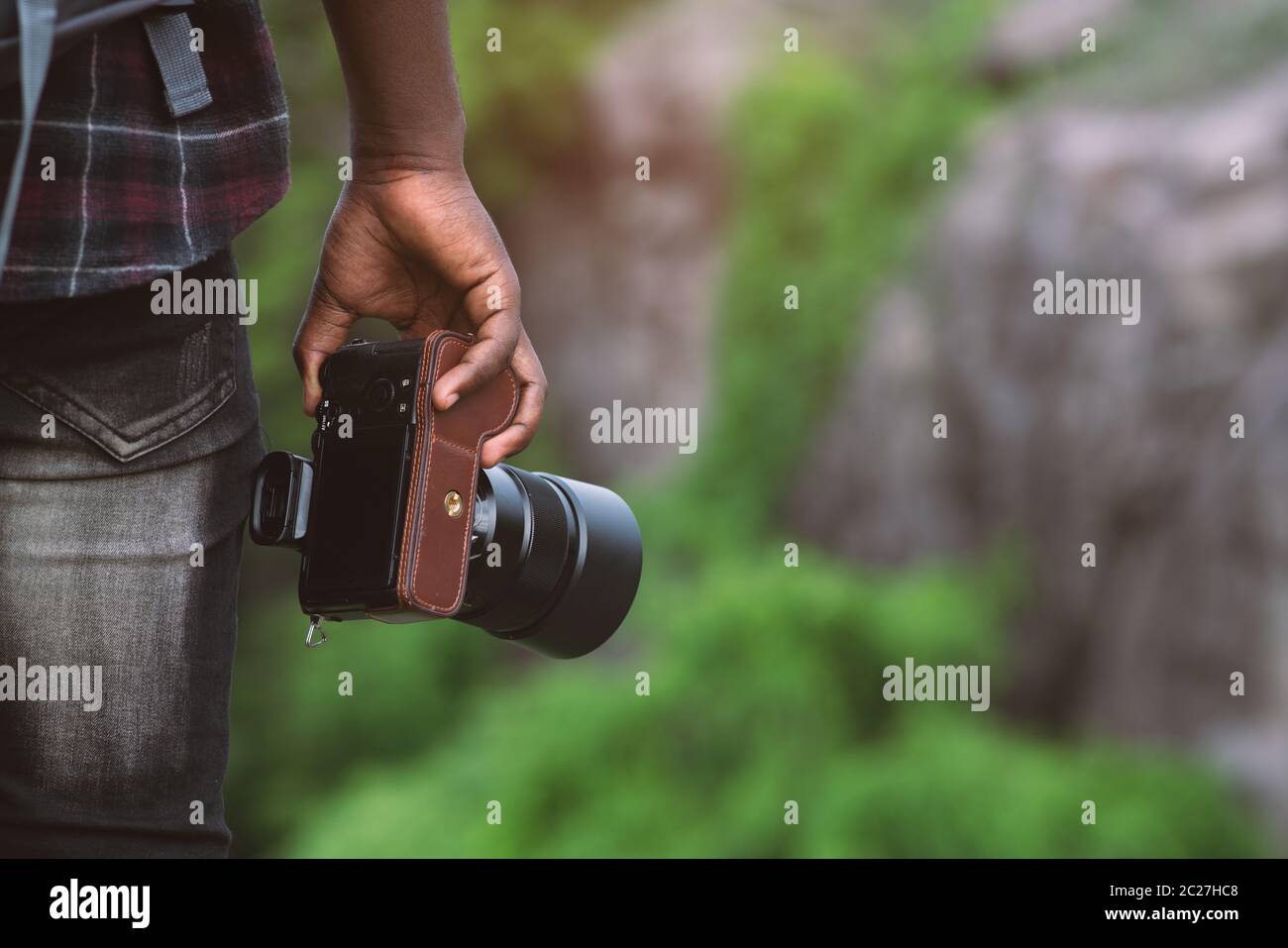 African man holding the camera Stock Photo - Alamy