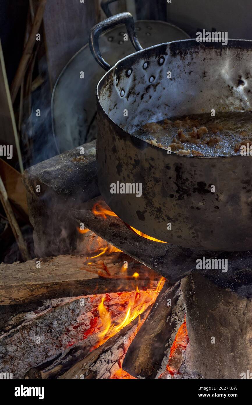 Old wood burning stove with big pan in a dirty kitchen Stock Photo - Alamy