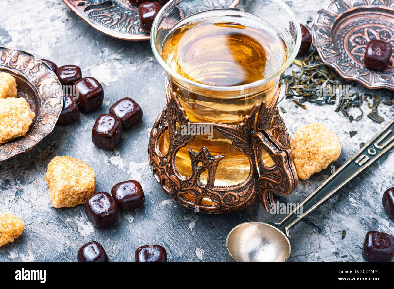 Cups of turkish tea with oriental sweets.Eastern tea Stock Photo - Alamy