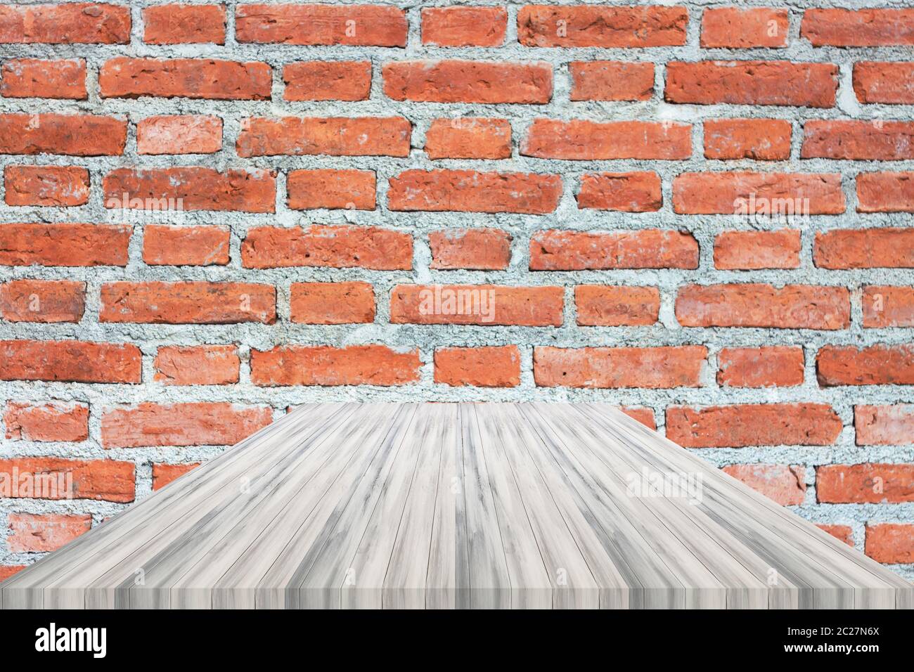 White table top on brick wall. For product display Stock Photo - Alamy