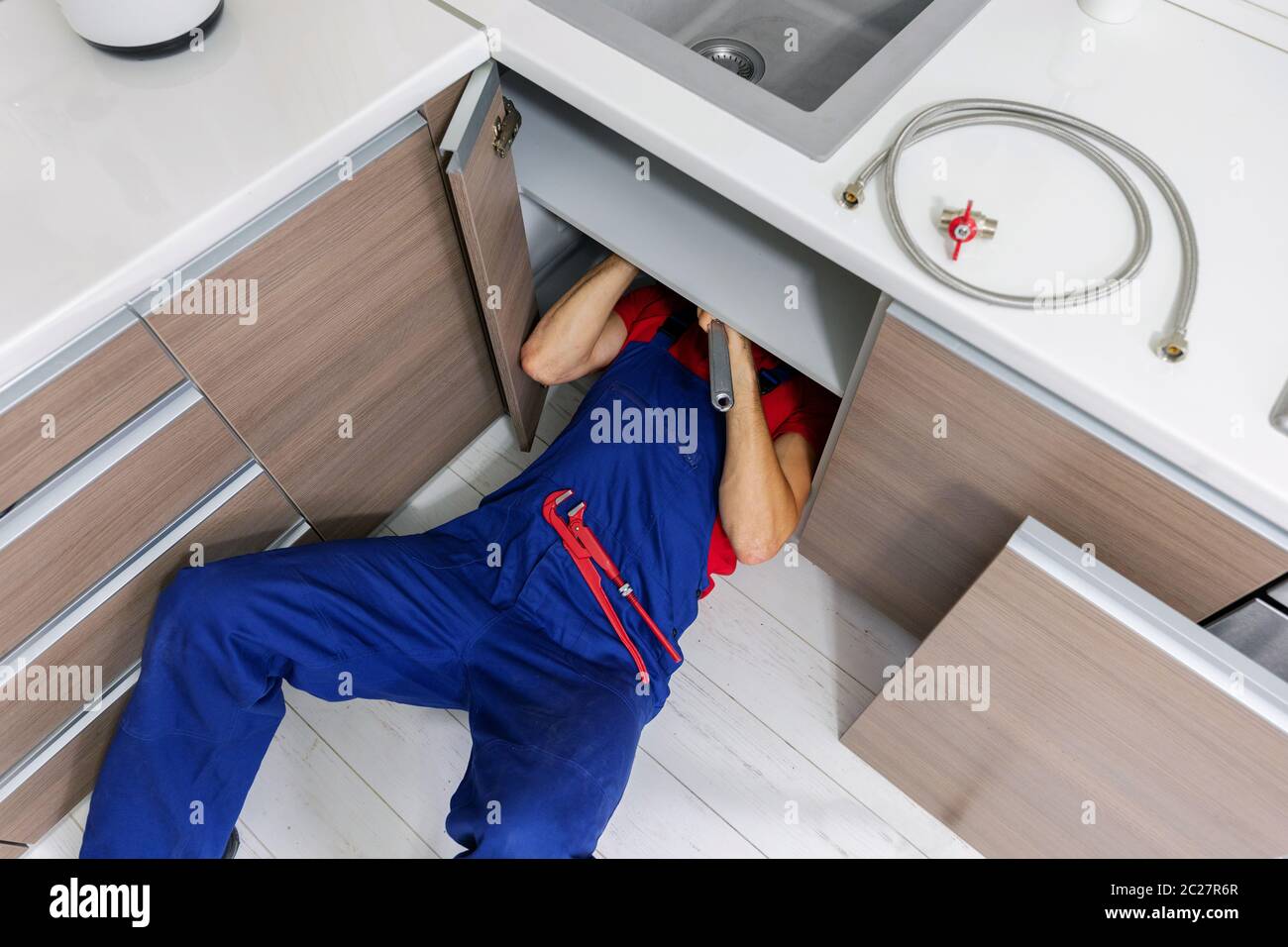 Pipes under kitchen sink hi-res stock photography and images - Alamy