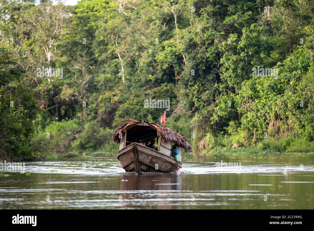 An Amazon river boat takes tourists on a tour of the Peruvian Amazon ...