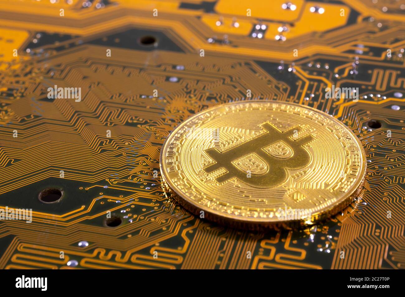 Bitcoin coin and printed circuit board PCB Stock Photo - Alamy