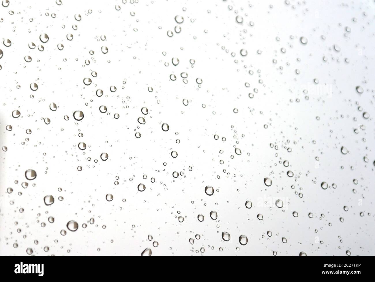Drops of rain on the inclined window (glass). Shallow DOF Stock Photo ...