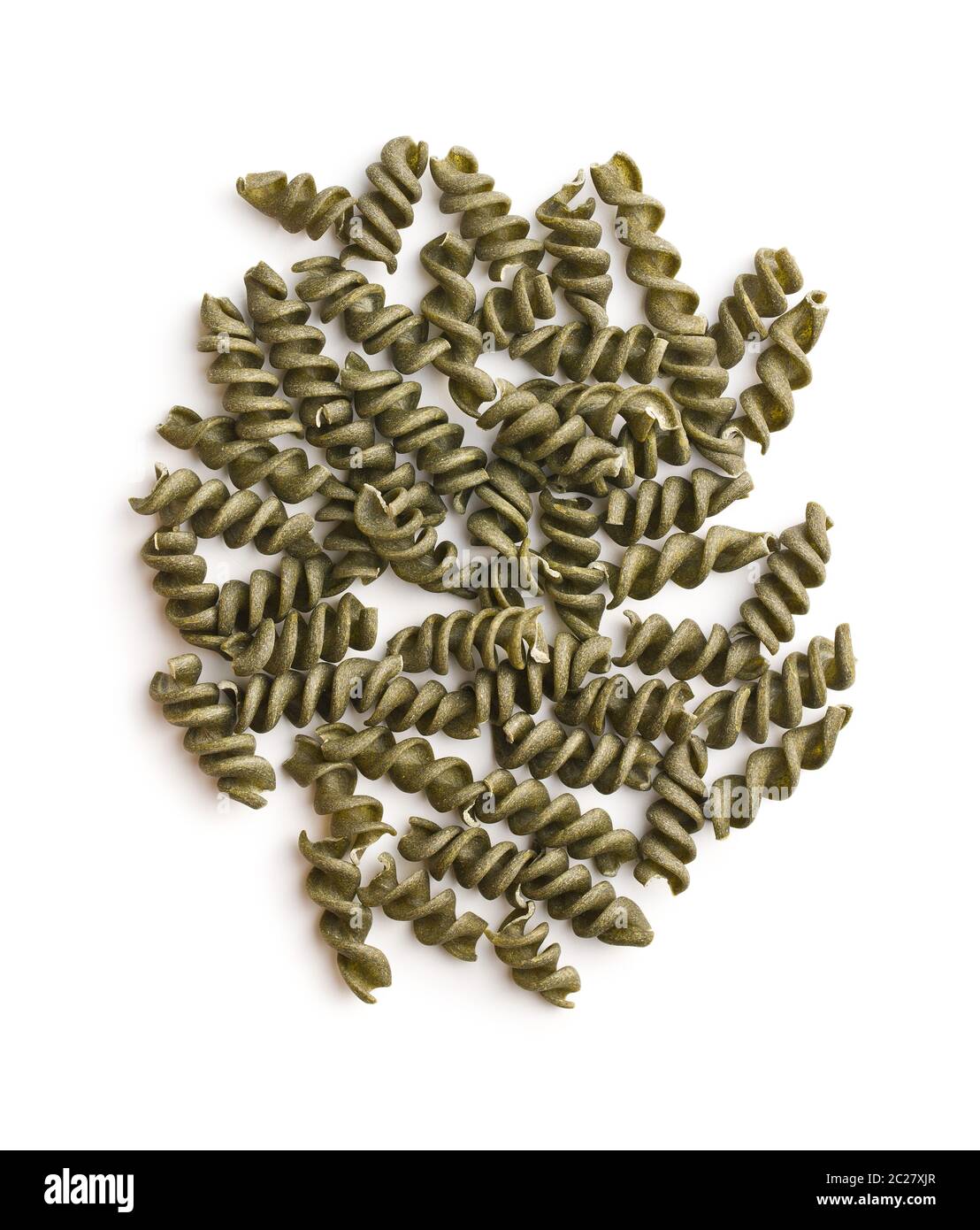 Uncooked colorful pasta with spinach flavor isolated on white ...