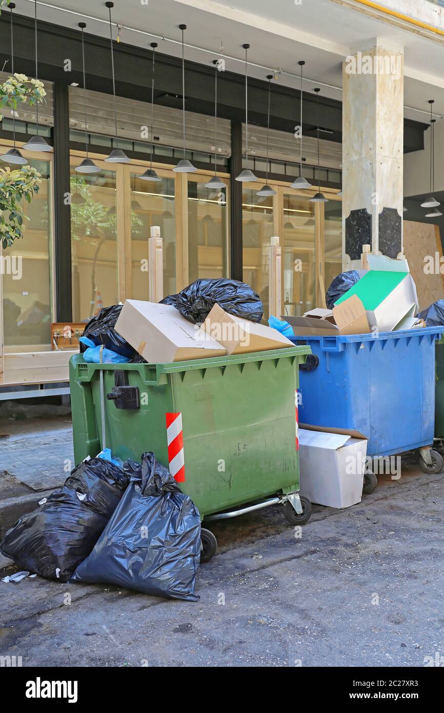 Overflow of Trash in Garbage Container at Athens Street Stock Photo - Alamy