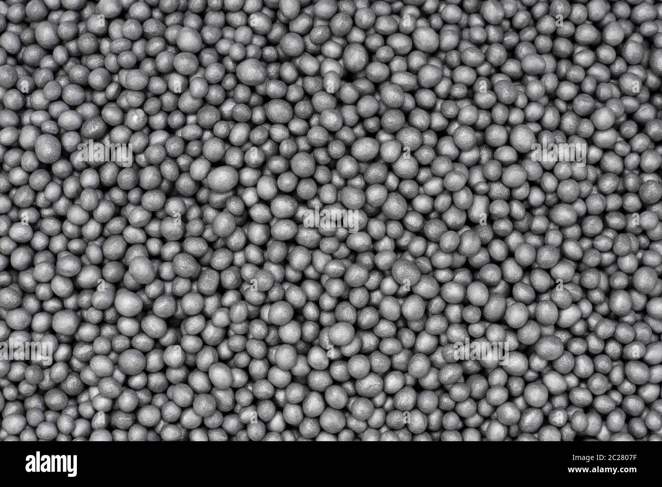Full frame closeup showing lots of dark polystyrene beadlets Stock ...