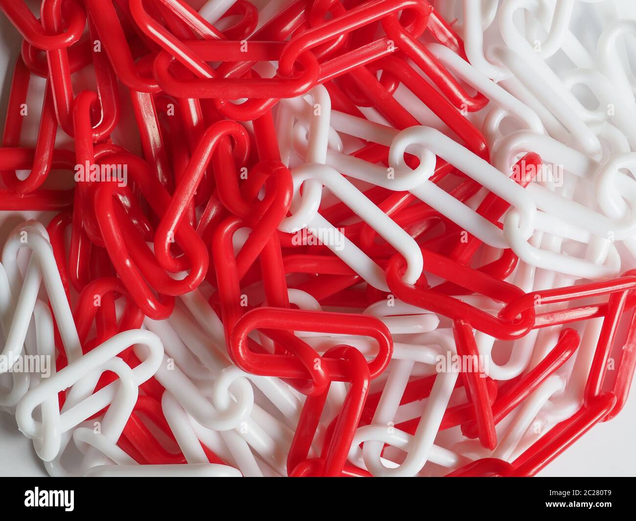 plastic red and white warning chain links Stock Photo - Alamy