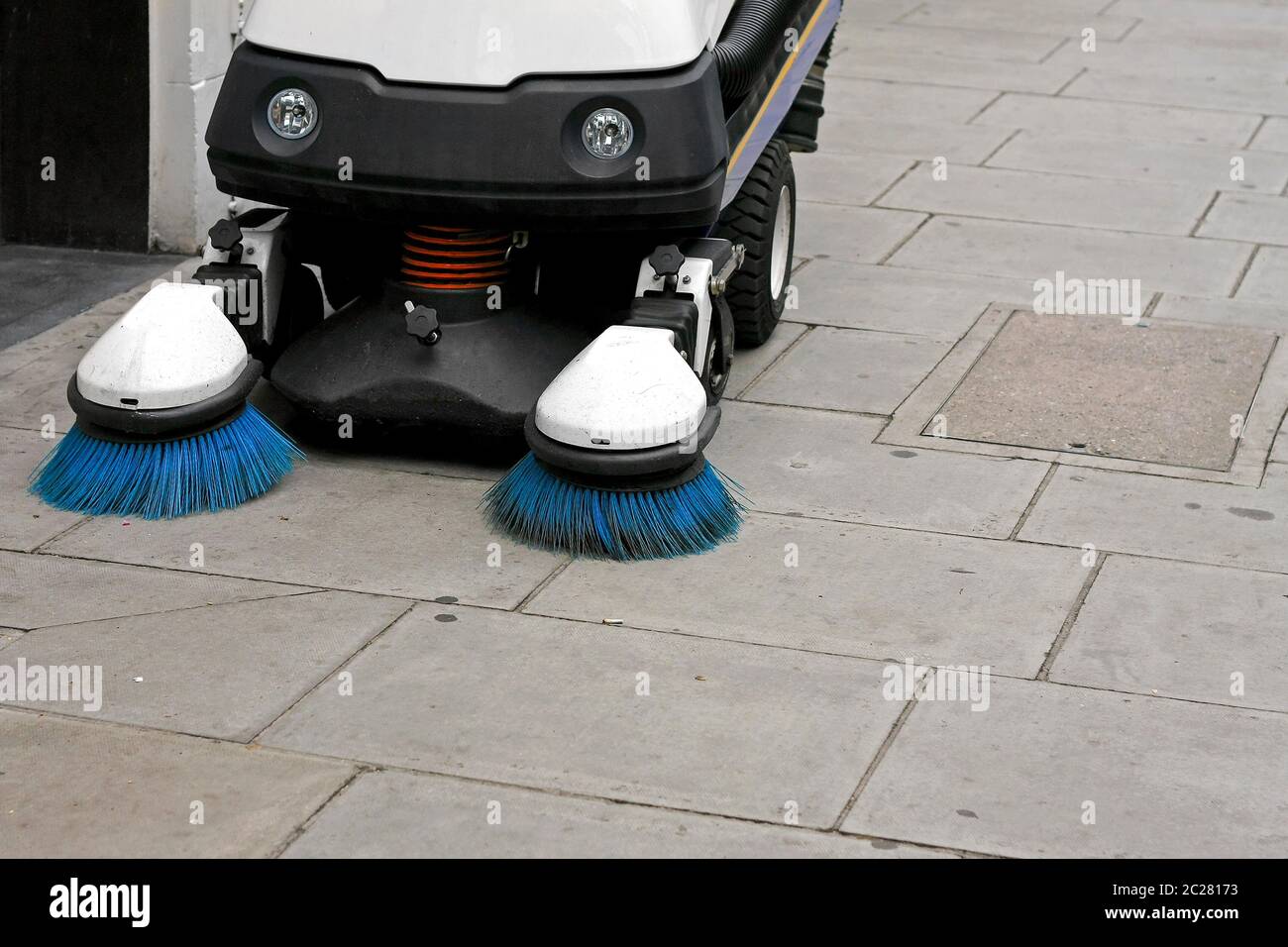 Revolving brushes at street sweeper machine vehicle hi-res stock ...