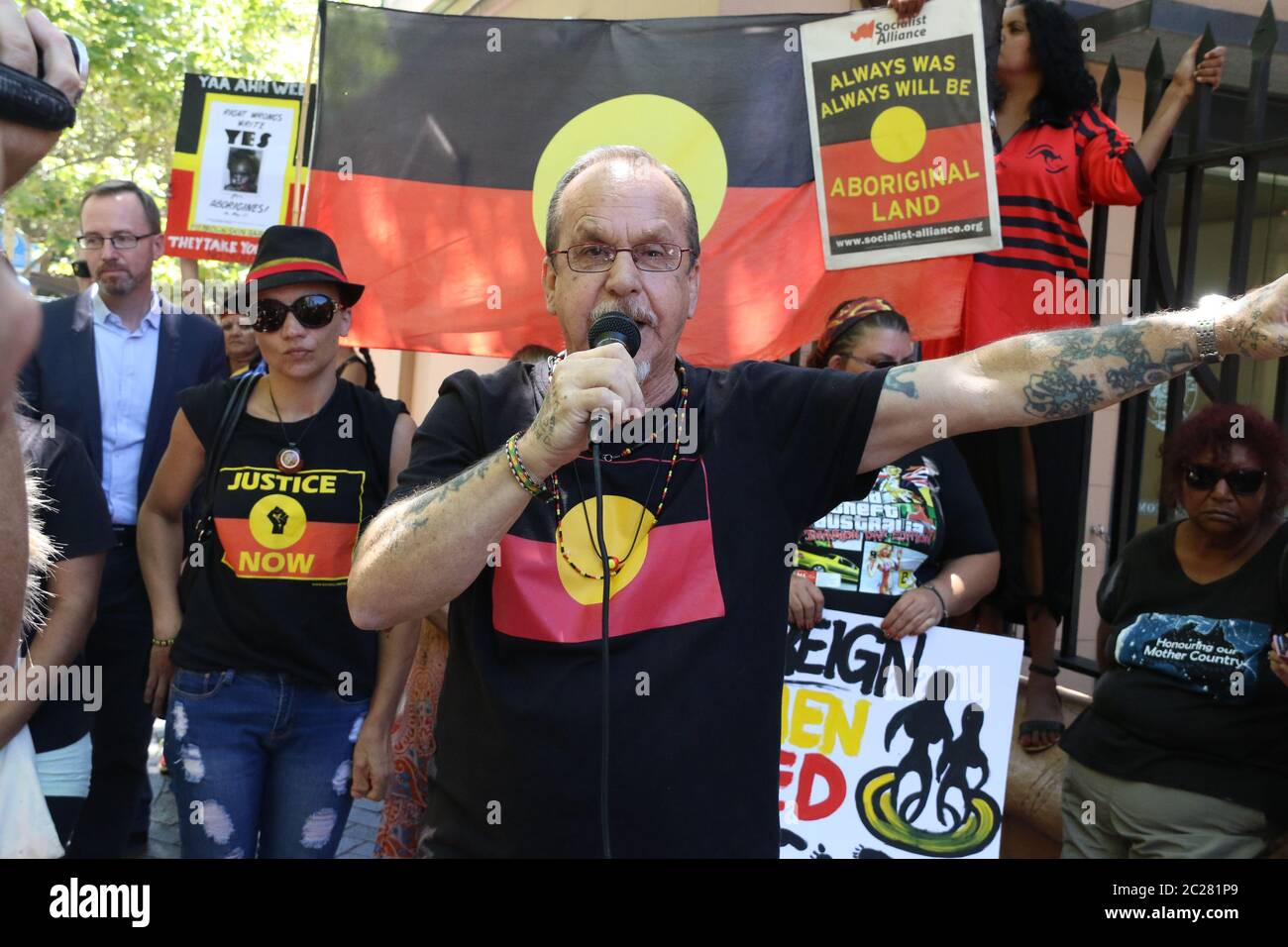 Pictured: Ken Canning speaks outside the NSW Parliament building on ...