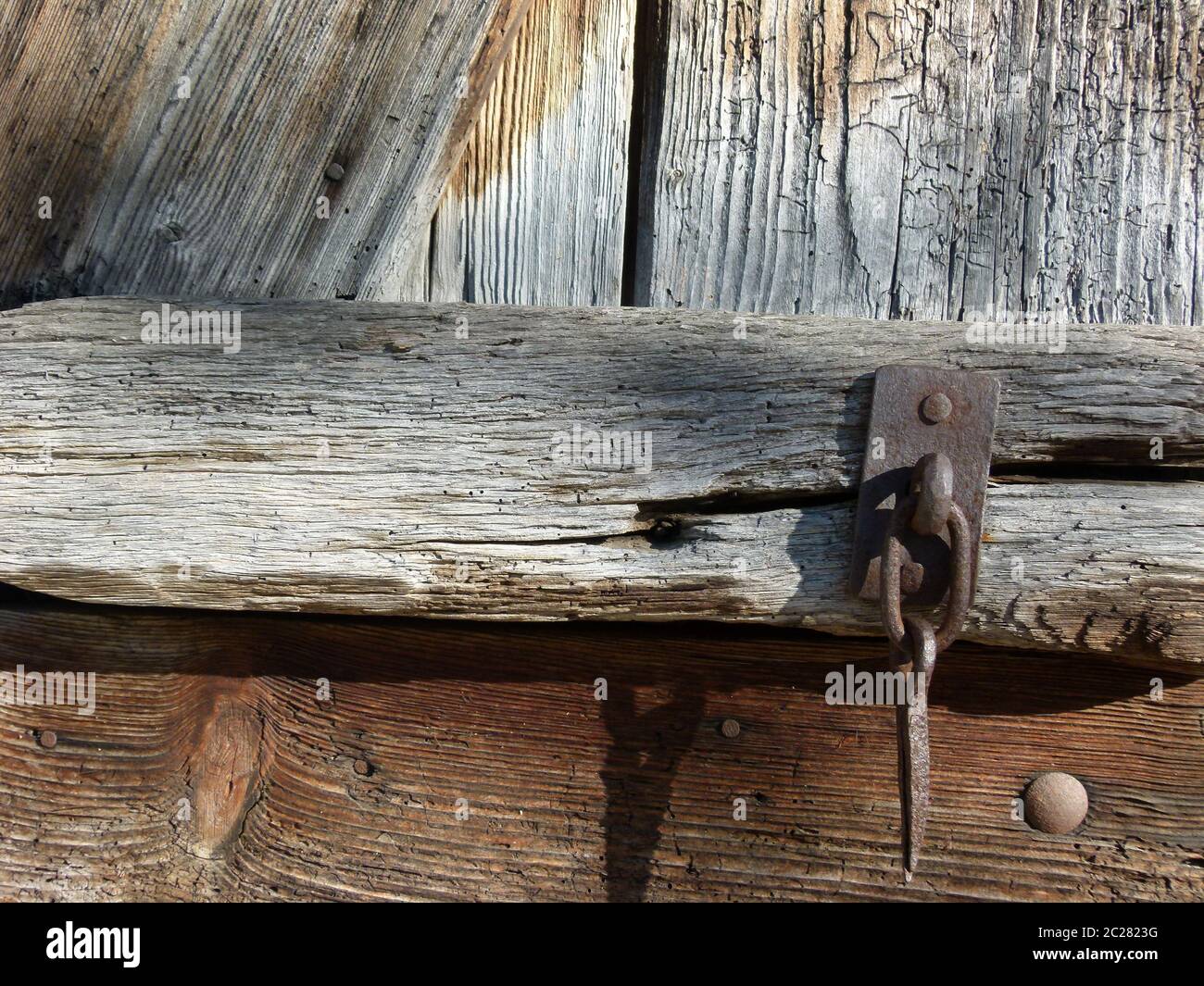 Detail of historic barn door with wood grain knotholes hi-res stock ...