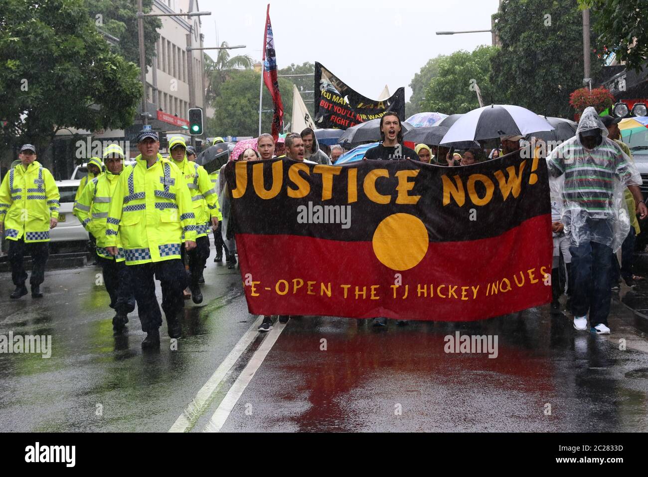 Pictured: Protesters march through Redfern Stock Photo - Alamy