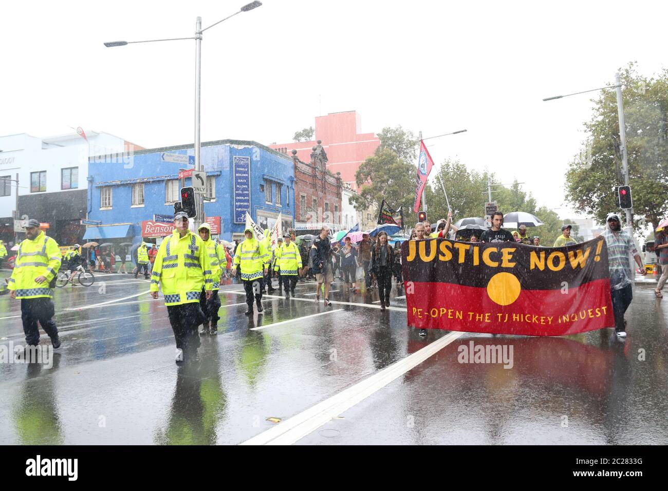 Pictured: Protesters march through Redfern Stock Photo - Alamy