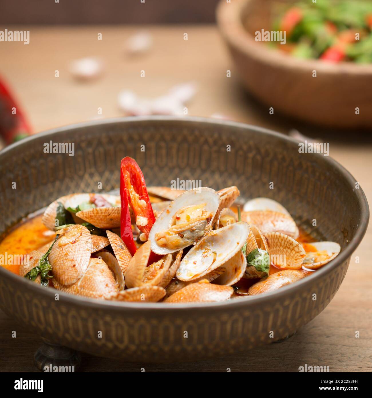 stir fried clams with roasted chili paste Stock Photo - Alamy