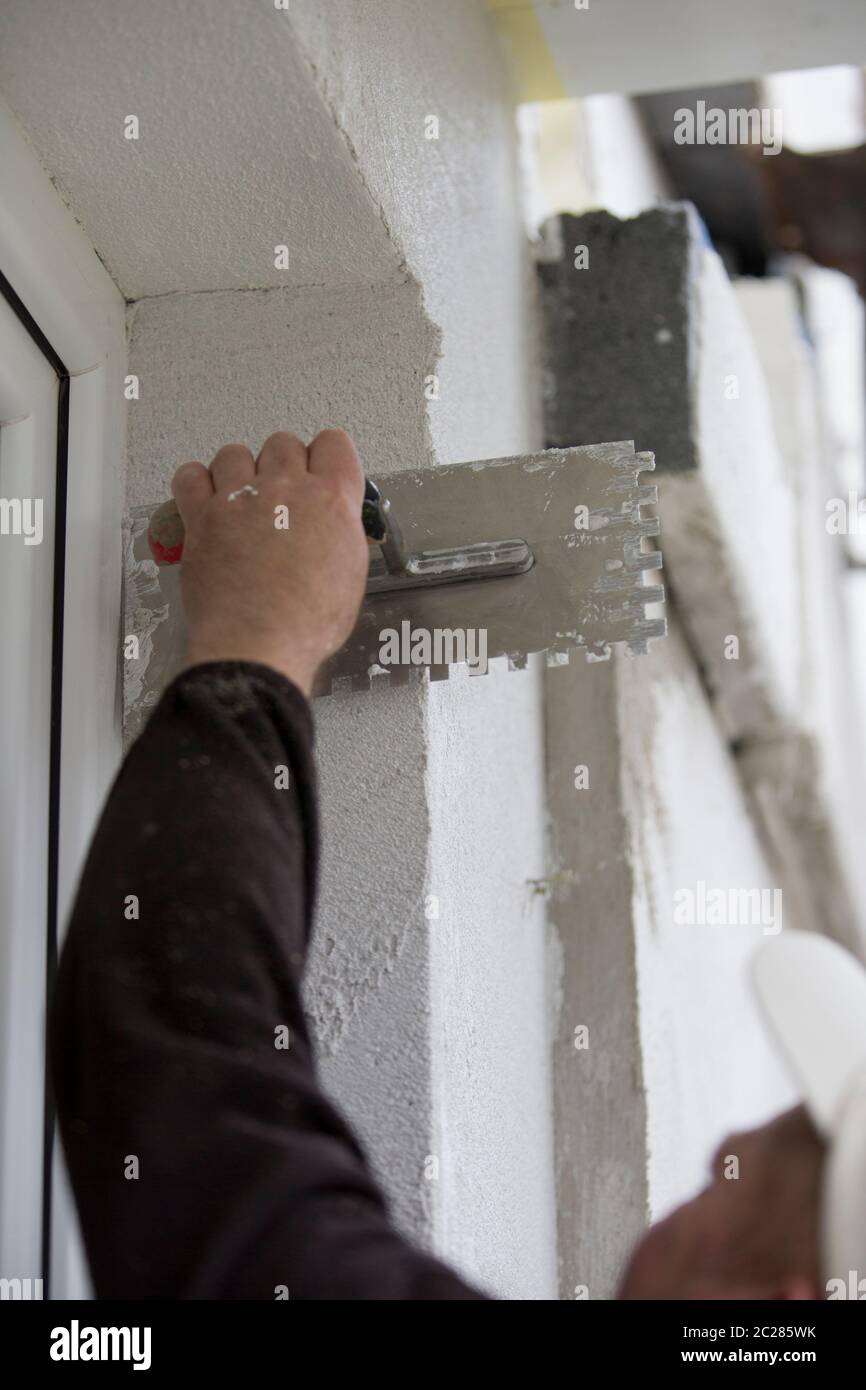 plastering, close up arm Stock Photo - Alamy