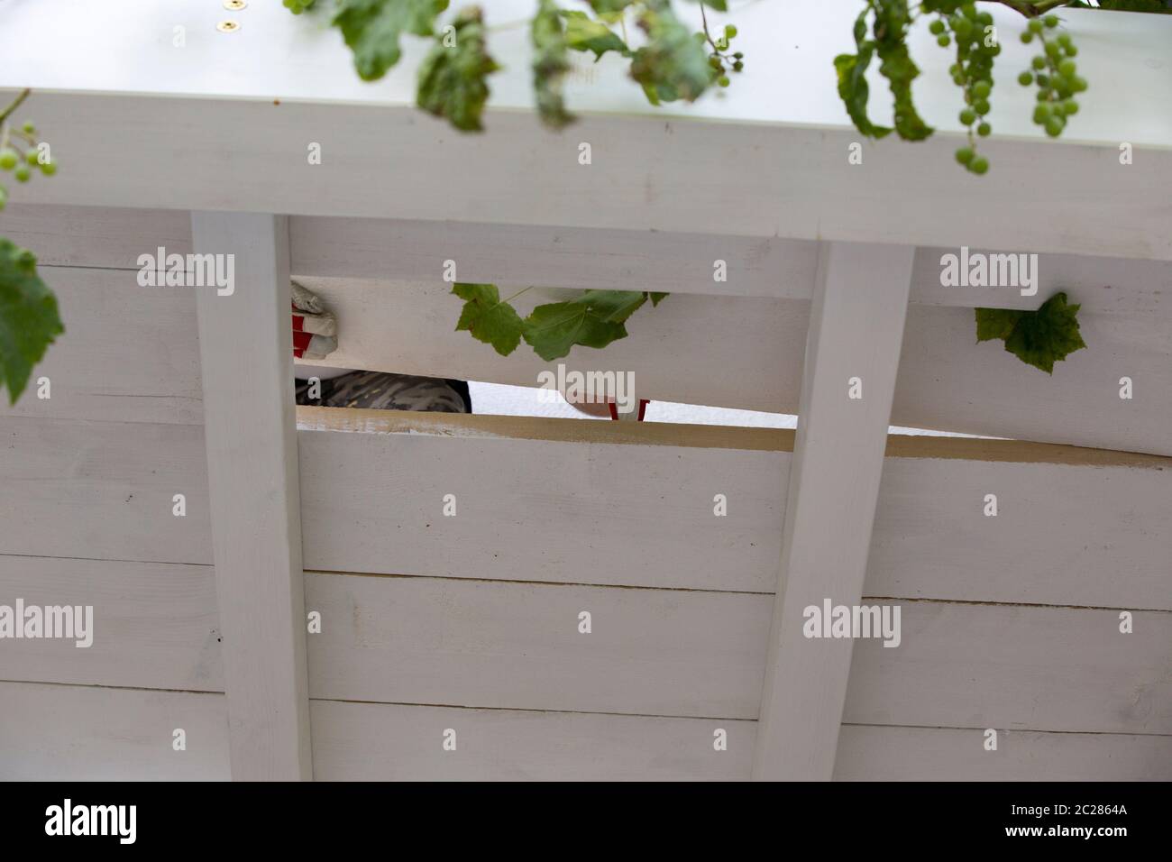 carpenter works building a balcony Stock Photo - Alamy