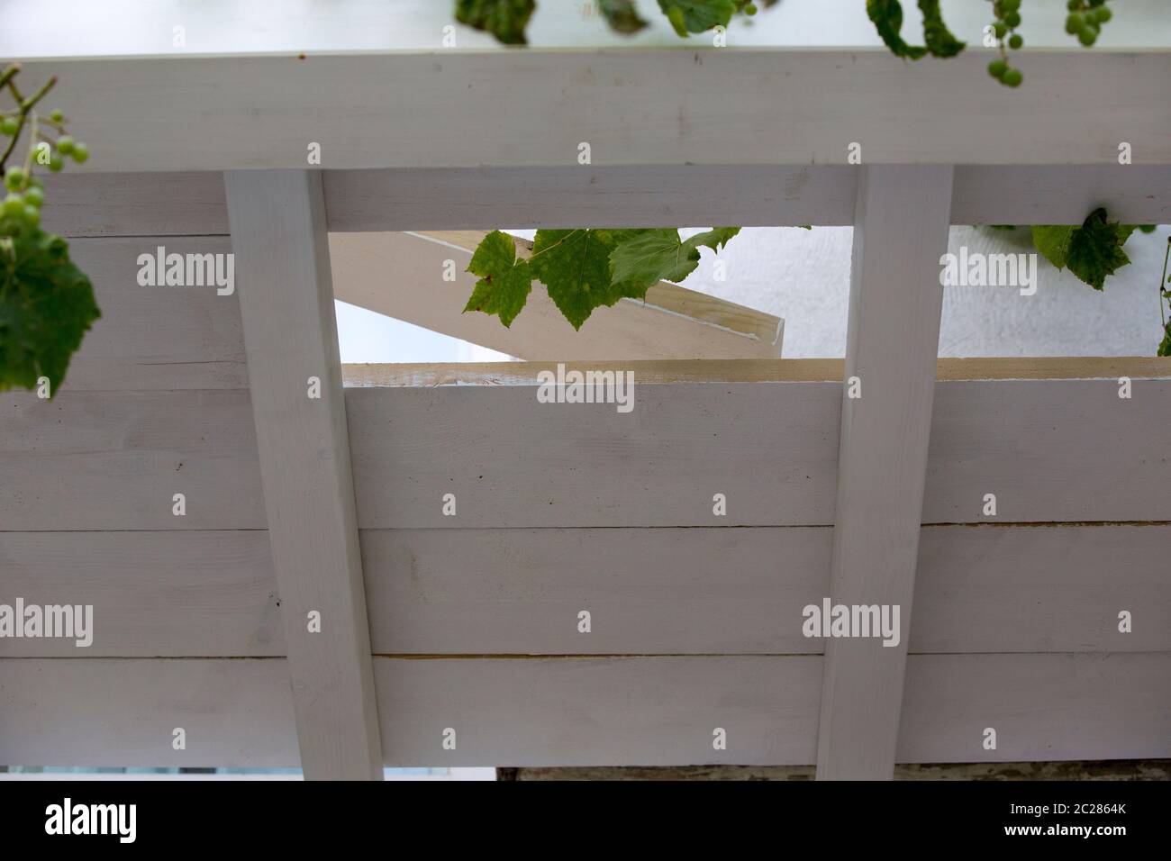 carpenter works building a balcony Stock Photo - Alamy
