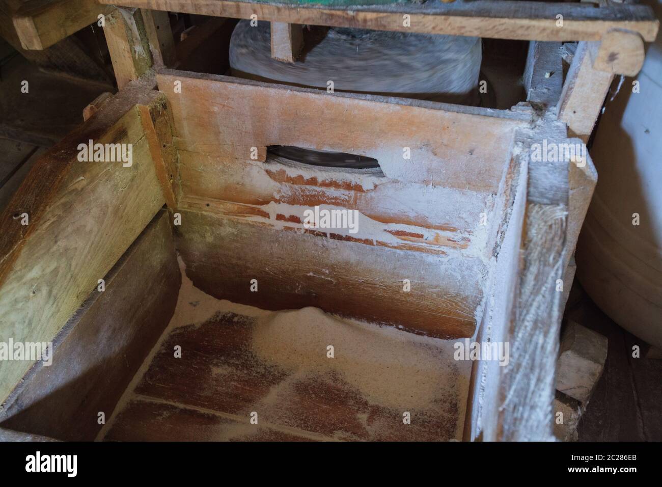 Traditional millstone for grinding grains at rustic mill Stock Photo ...
