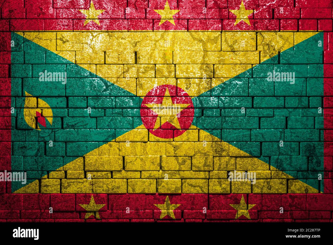 National flag of Grenada on brick wall background.The concept of ...
