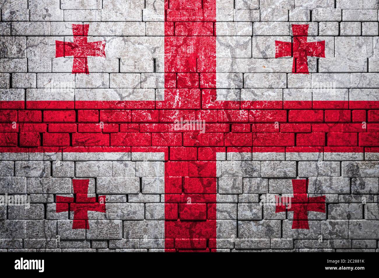 National flag of Georgia on brick wall background.The concept of ...