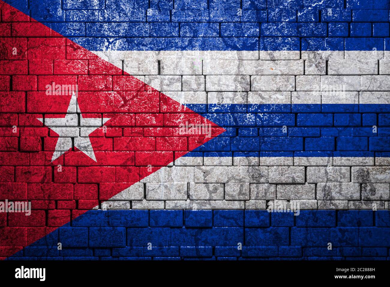 National flag of Cuba on brick wall background.The concept of national ...