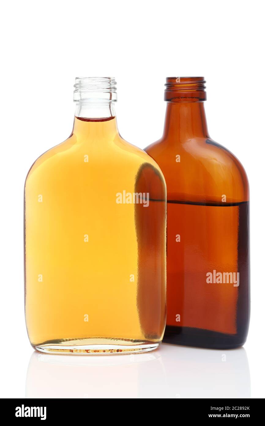 Glass bottle of whiskey on a white background Stock Photo - Alamy