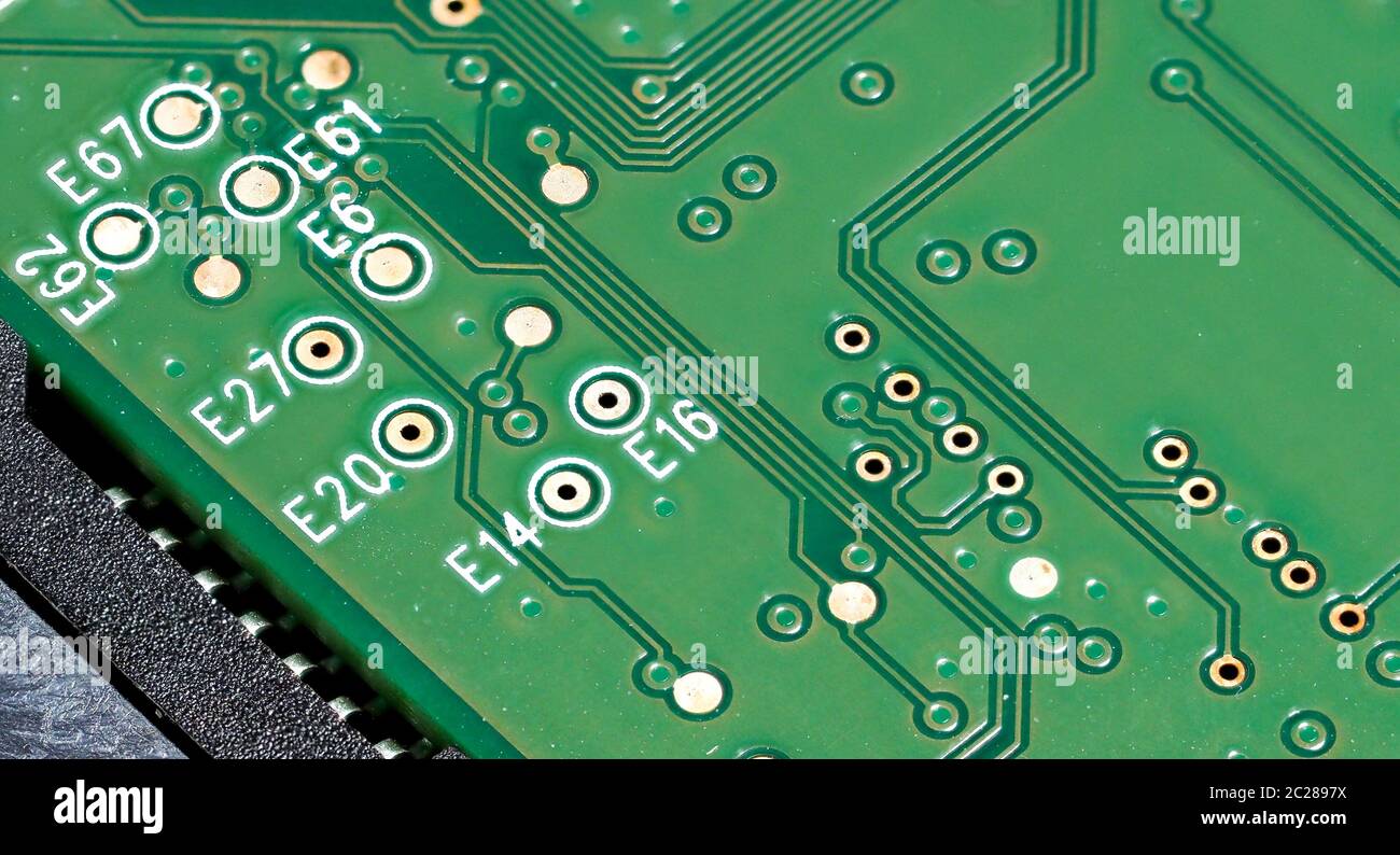 Closeup of green computer mother board, electronic elements and circuit ...