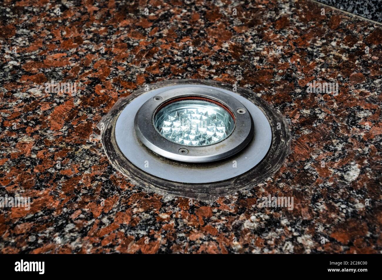 LED backlight in granite stone. Light fixture Stock Photo - Alamy
