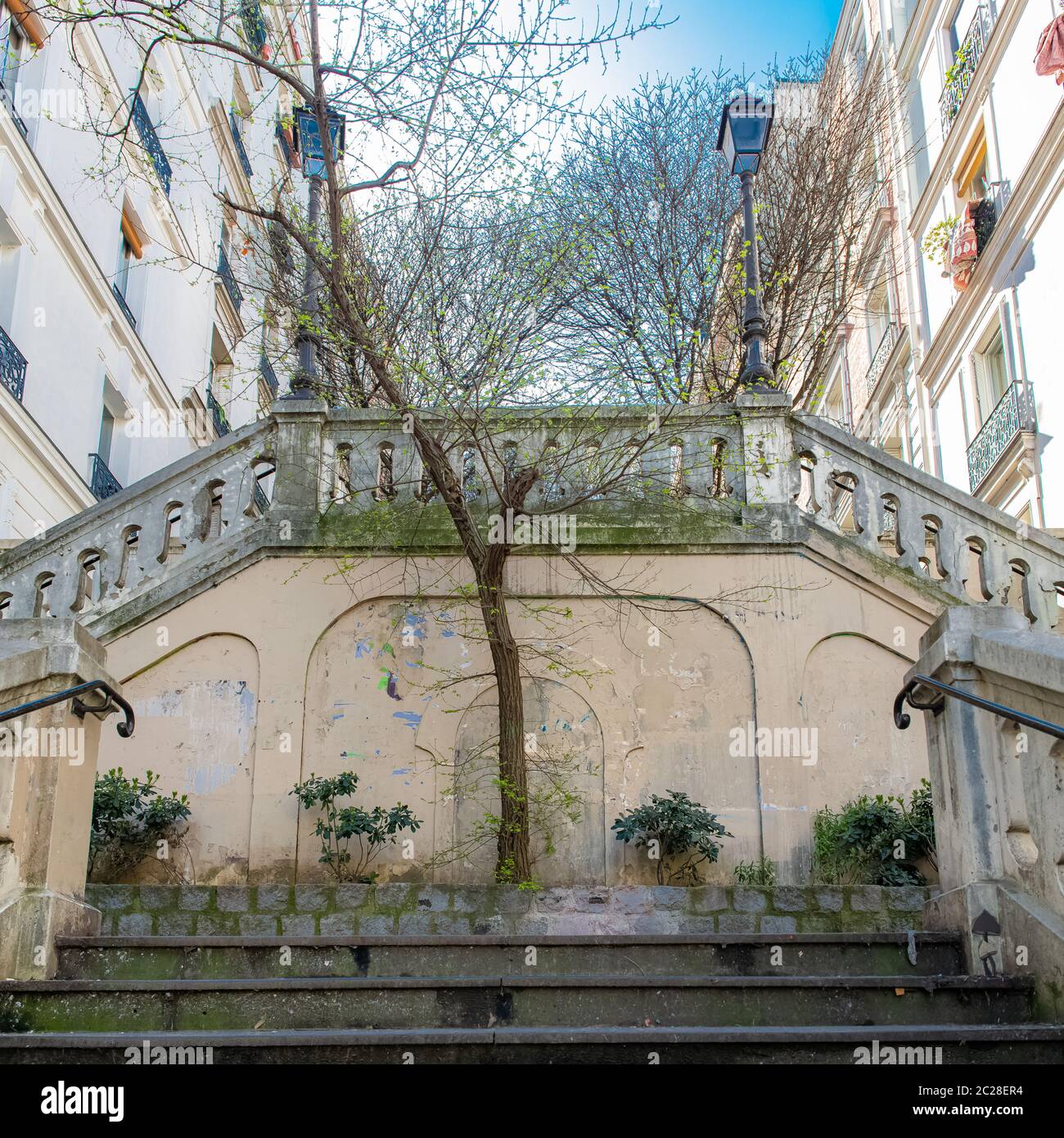 Paris, romantic staircase in Montmartre, typical buildings and floor ...