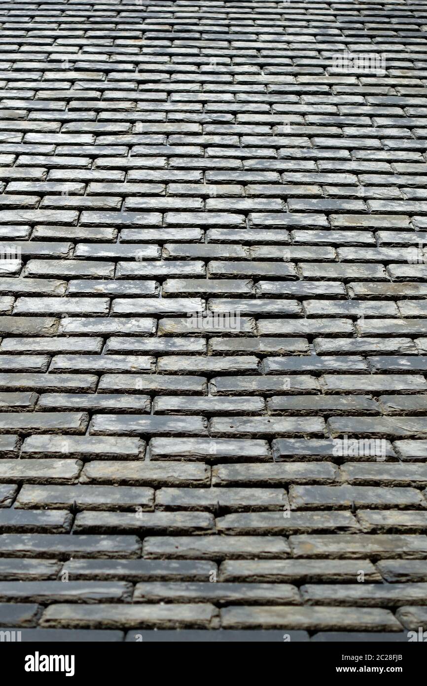 background of slate roof tiles on an old building Stock Photo - Alamy