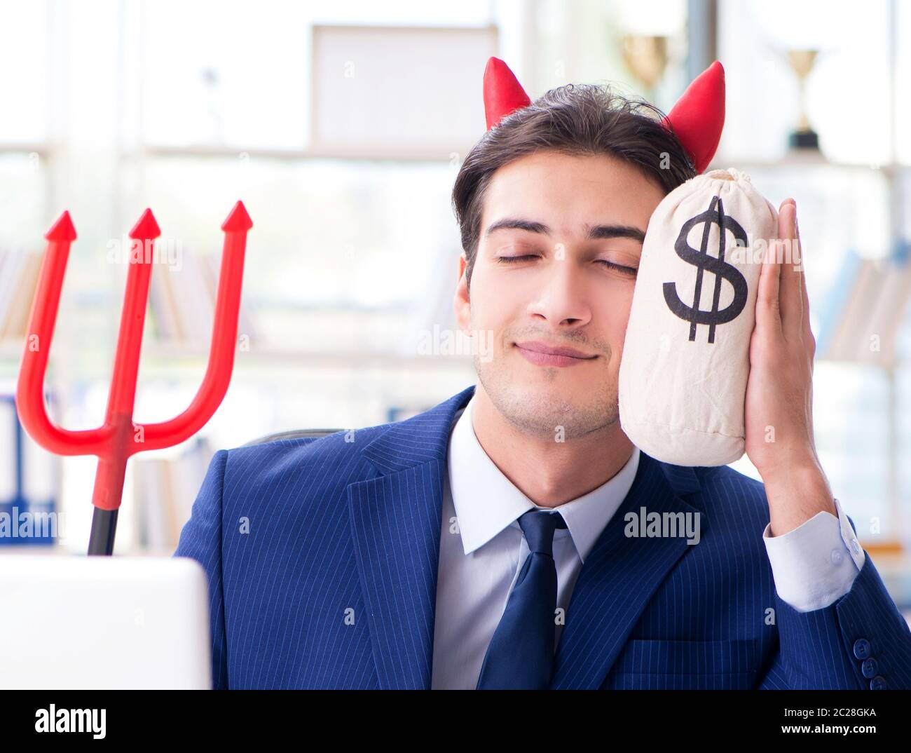 Devil angry businessman in the office Stock Photo - Alamy