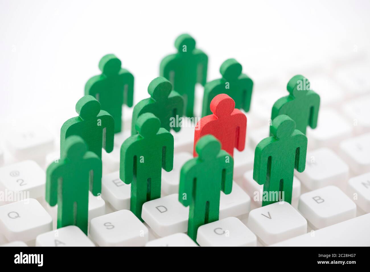 Unique person in the crowd on computer keyboard Stock Photo - Alamy