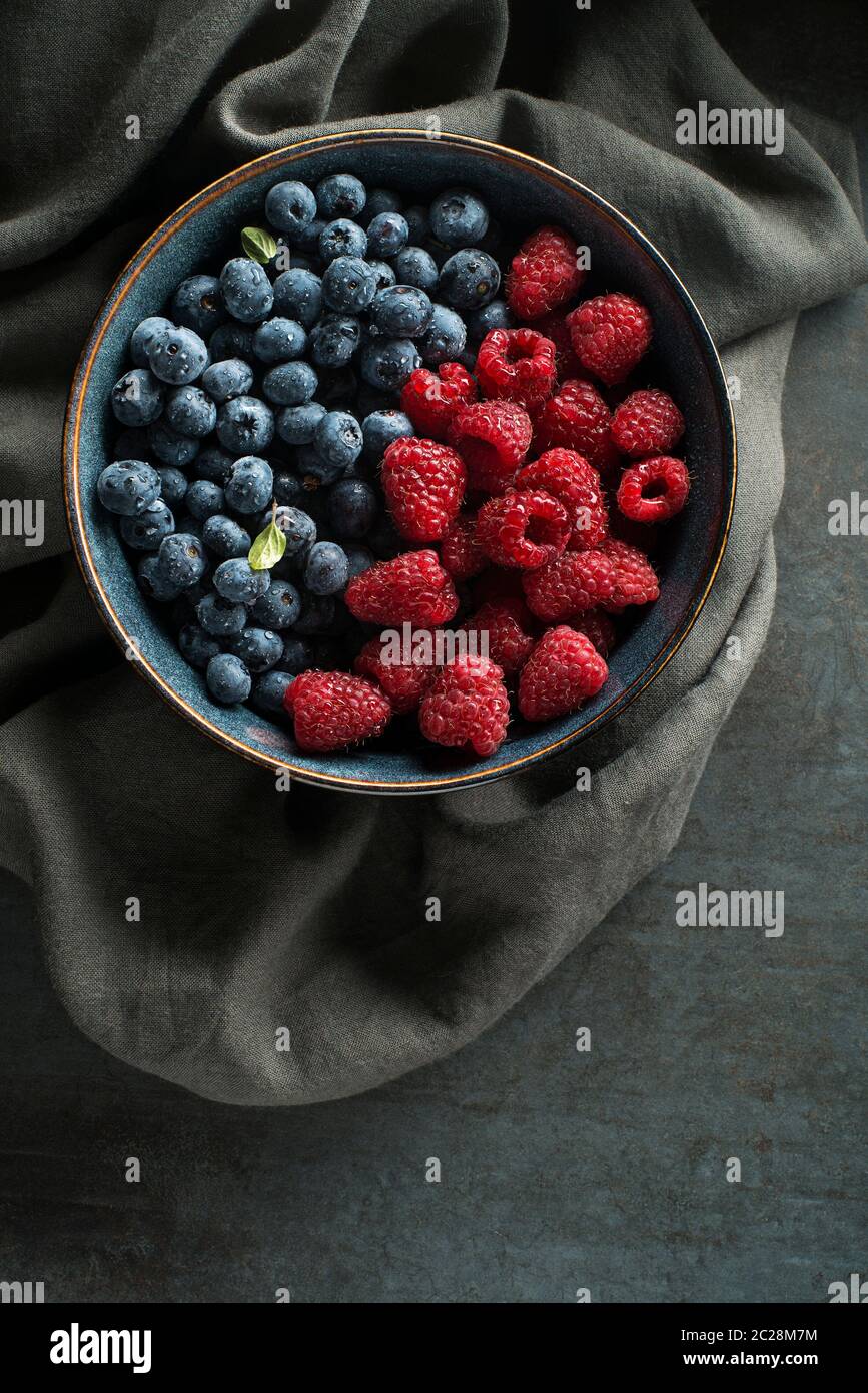Berries overhead closeup colorful assorted mix of blueberry and ...