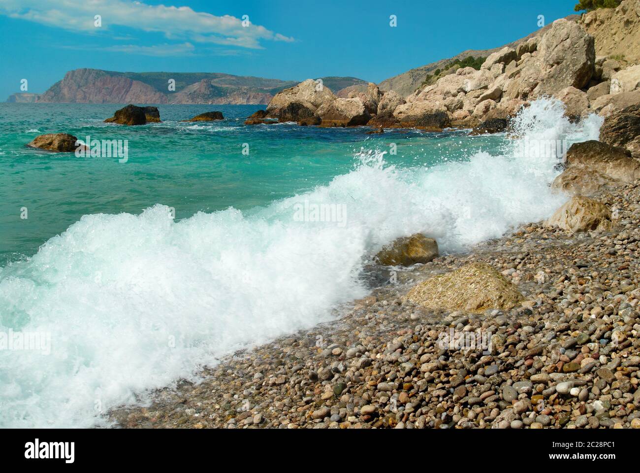 Beautiful sea landscape. Shore, beach and rocks Stock Photo - Alamy