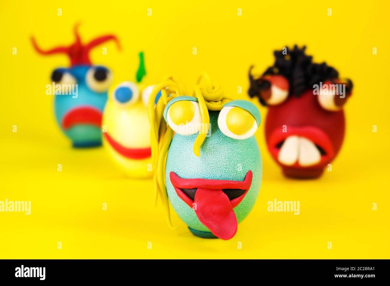 Easter Eggs Cartoonish Characters With Plasticine Eyes, Mouth and Hair ...