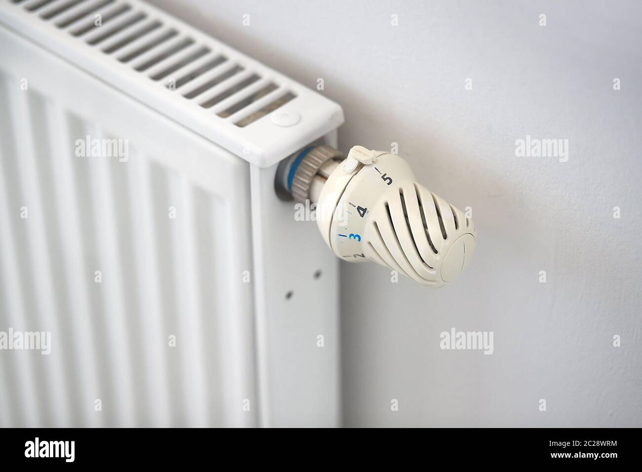 Heating radiator detail in a room Stock Photo - Alamy