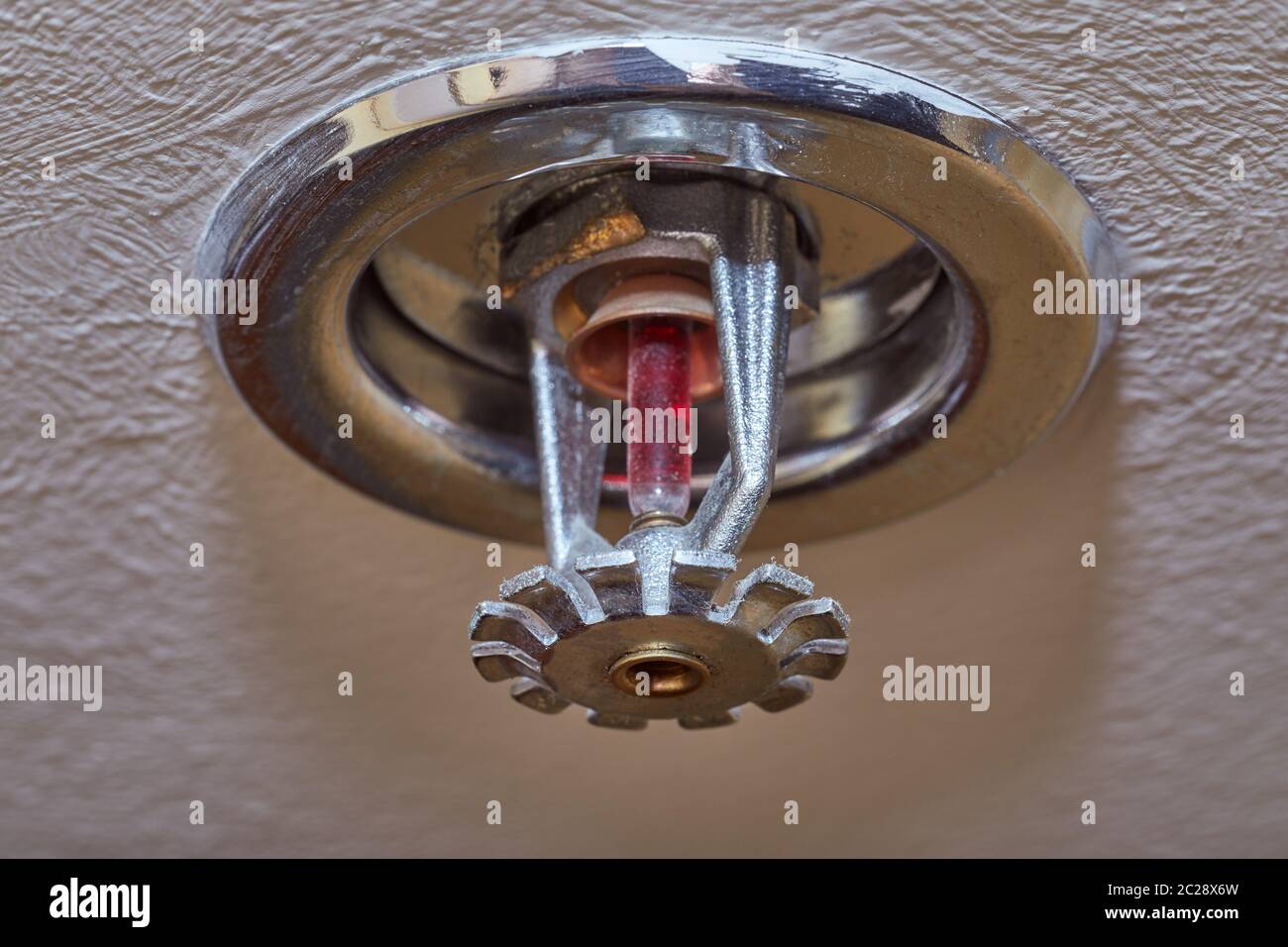 Fire safety sprinkler on the ceiling Stock Photo - Alamy