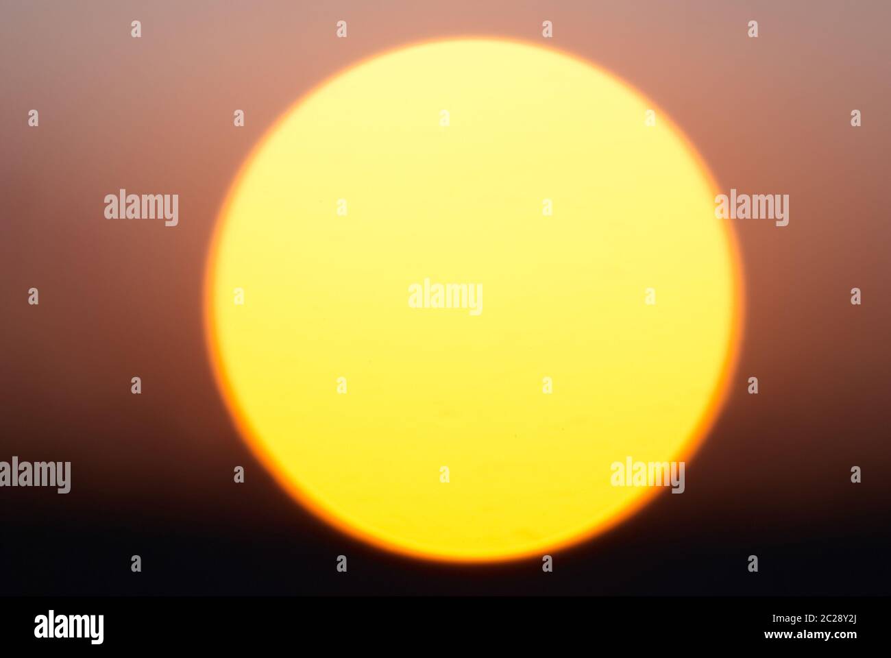 Big red star Sun. Sunset over the horizon Stock Photo - Alamy